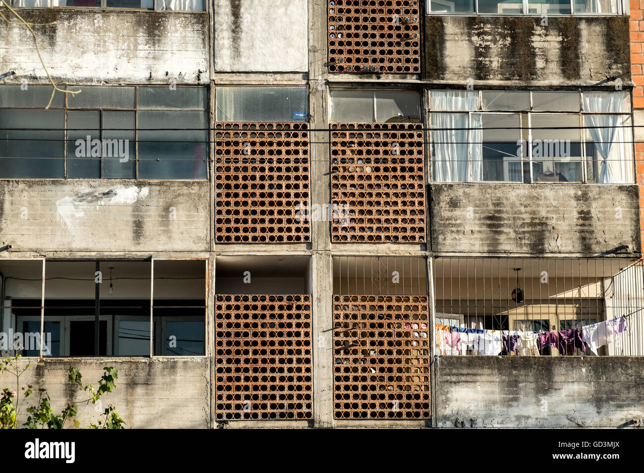 Dirty facade of a derelict apartment building Stock Photo - Alamy