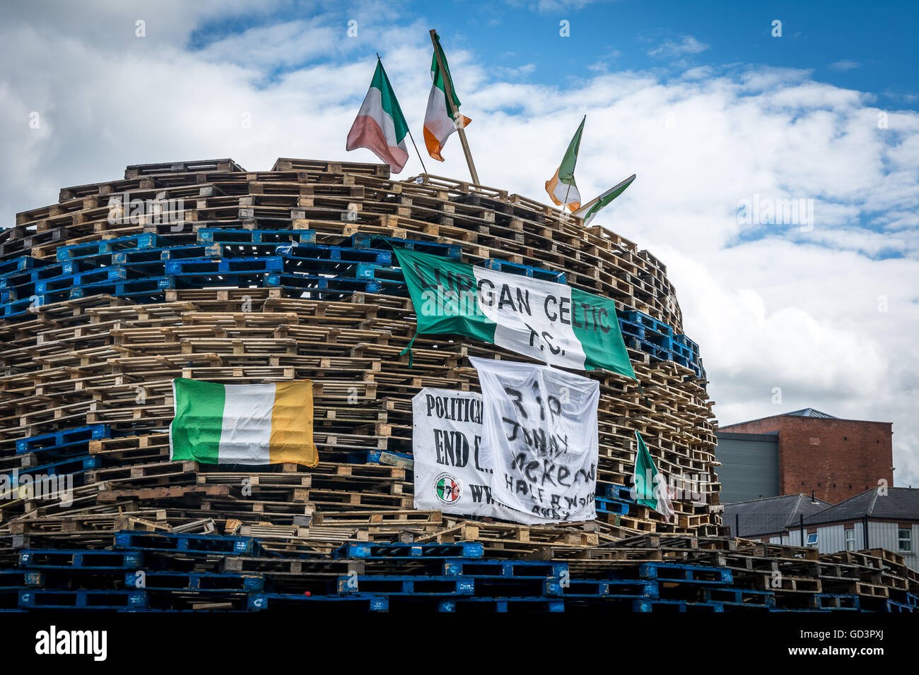Belfast, UK. 11th July, 2016. Republican material on Loyalist bonfire ...