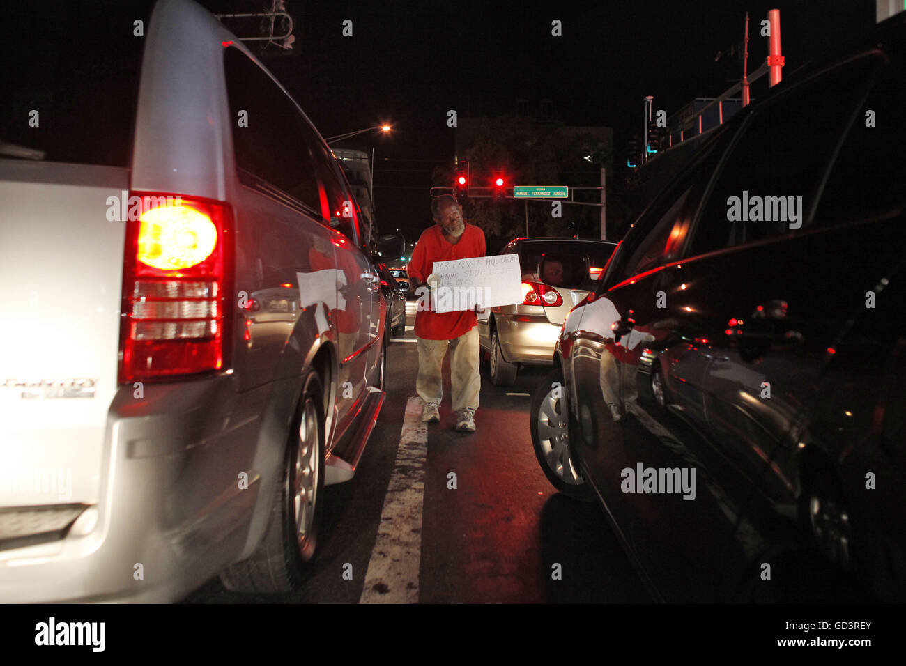 San Juan, Puerto Rico. 21st June, 2013. A homeless man begs for money ...