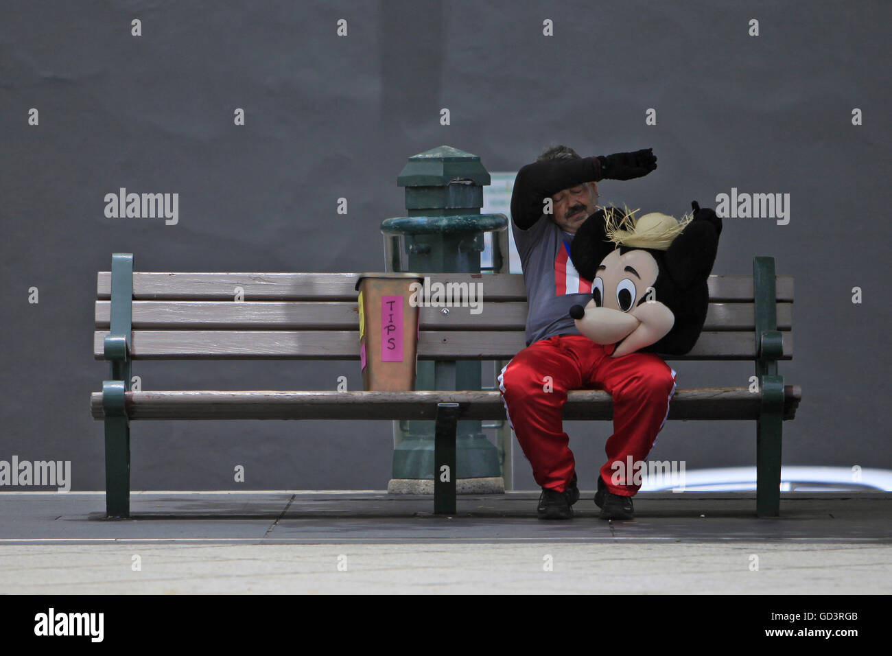San Juan, Puerto Rico. 1st July, 2015. A street performer in a Mickey ...