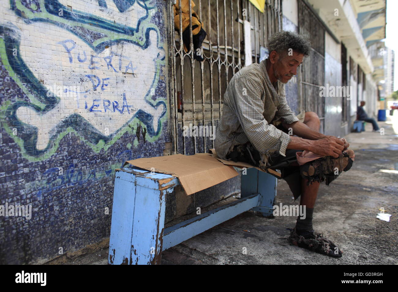 San Juan, Puerto Rico. 2nd Aug, 2015. A homeless man improvises his ...