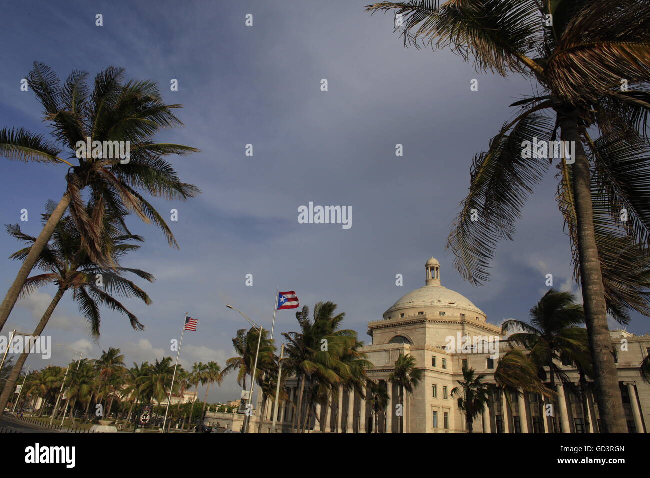 San Juan, Puerto Rico. 1st July, 2015. U.S. and Puerto Rican flags fly ...