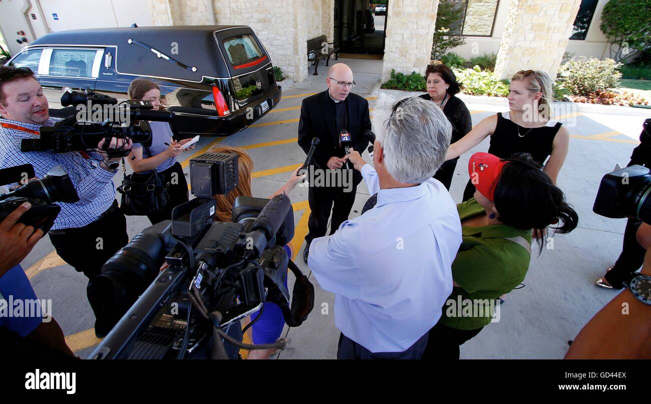 Dallas, Texas, USA. 12th July, 2016. Father Michael Forge speaks to the ...