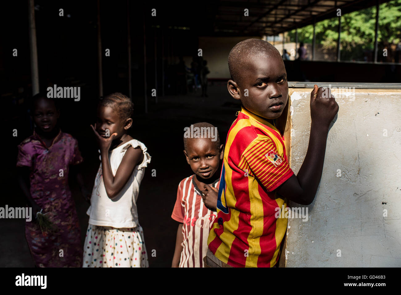 Juba, South Sudan. 12th July, 2016. Children stand on the grounds of ...