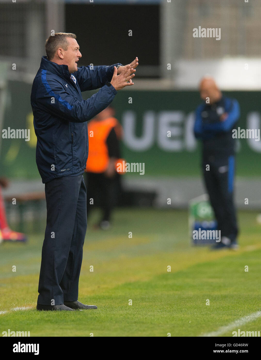 England's coach Adrian Boothroyd gives instructions in a group match of ...