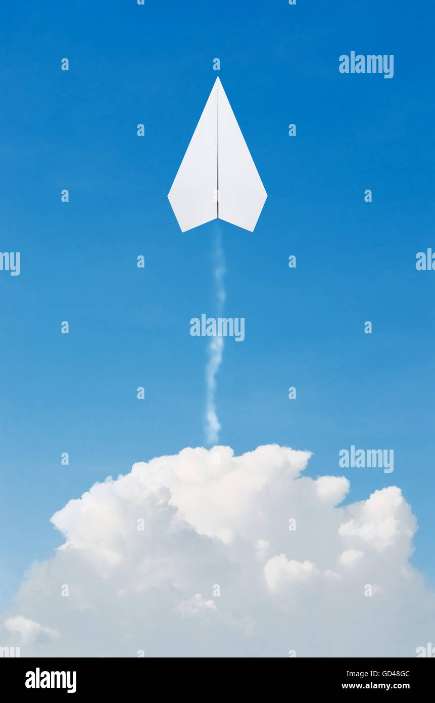 Paper plane flying up, over clouds with blue sky Stock Photo - Alamy