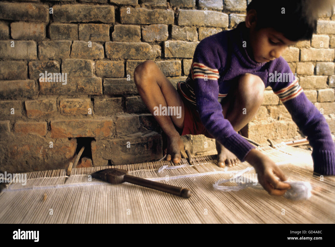 Poor kid working not school hi-res stock photography and images - Alamy