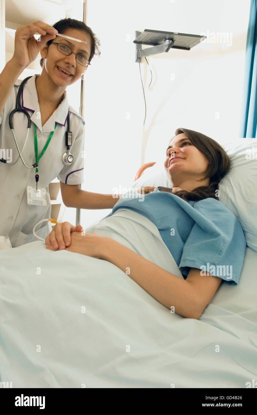 Doctor with patient Stock Photo - Alamy