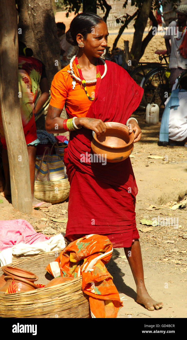 Woman selling pots Stock Photo - Alamy