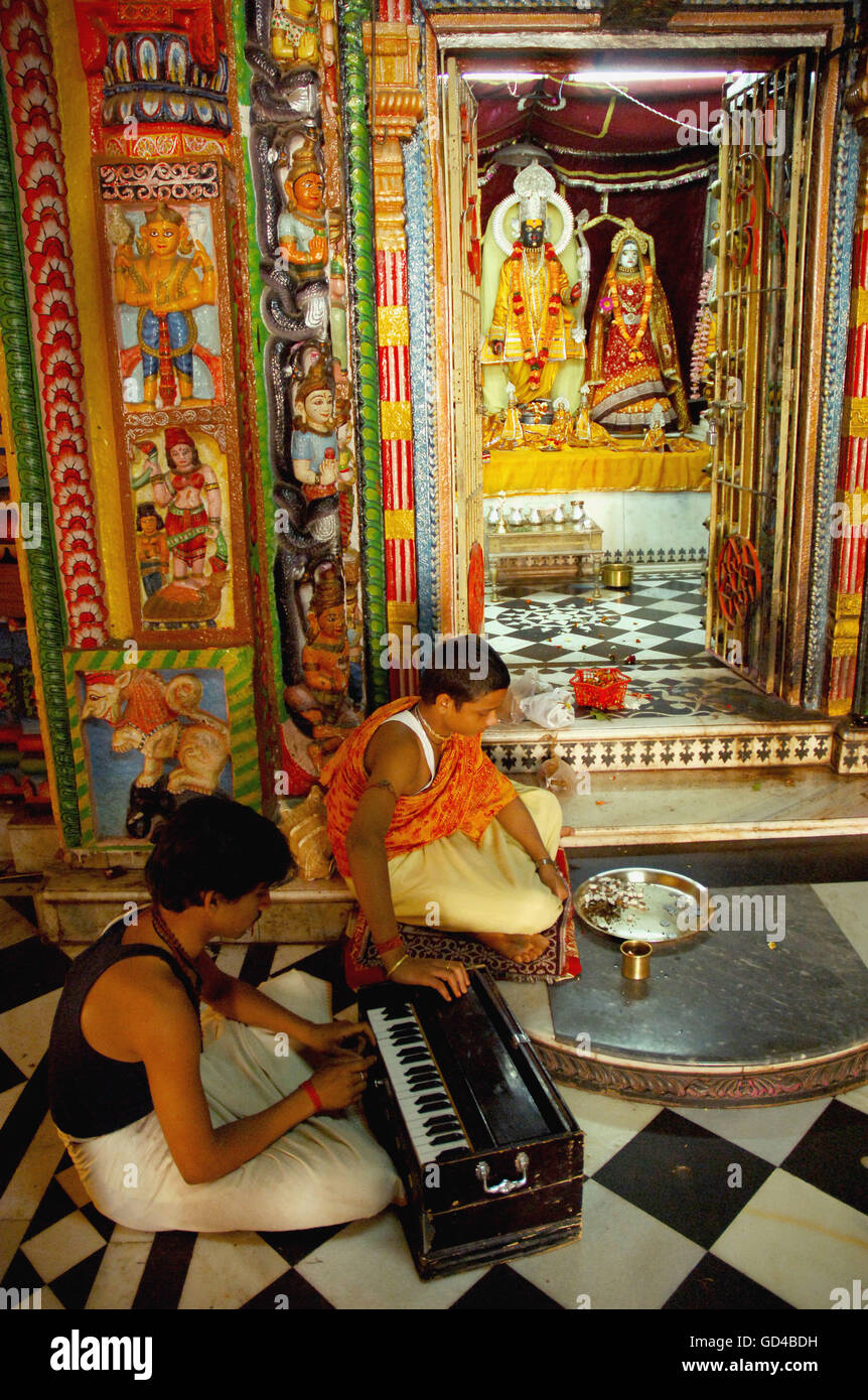 Devotees in temple Stock Photo - Alamy
