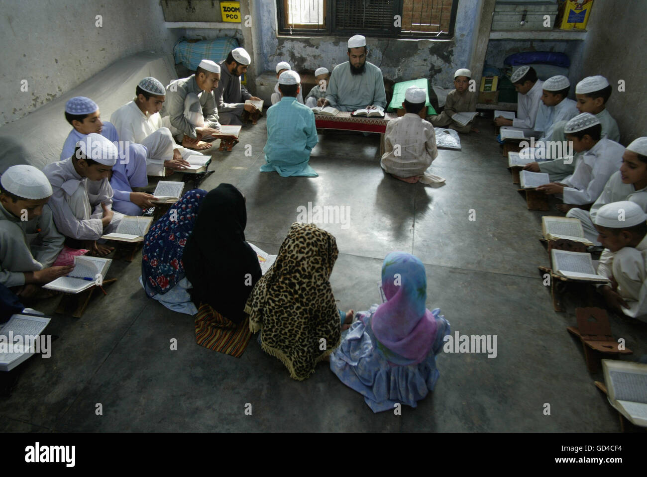 muslim children attending communal classes in Madrassa Stock Photo - Alamy