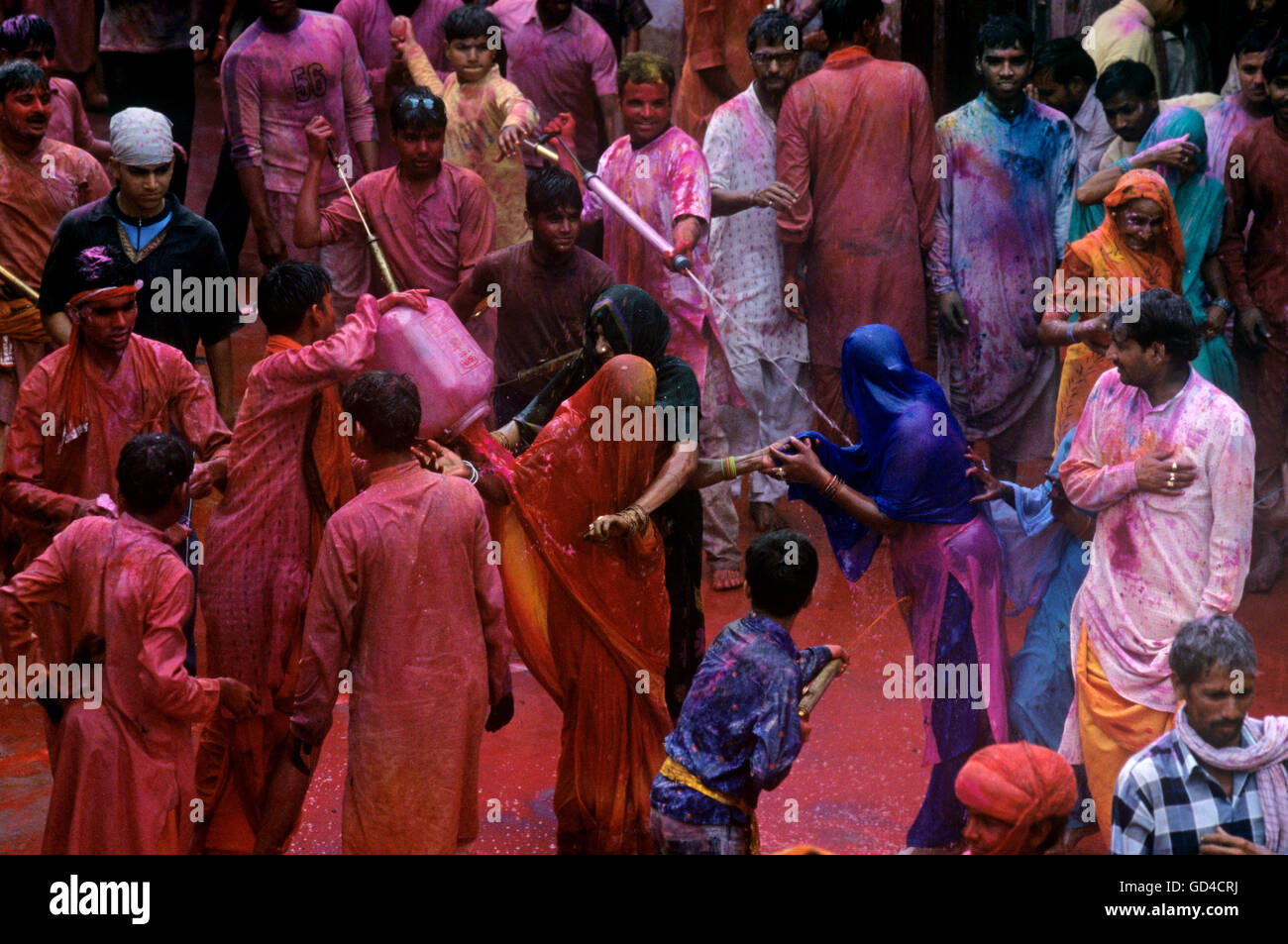 People playing holi Stock Photo - Alamy