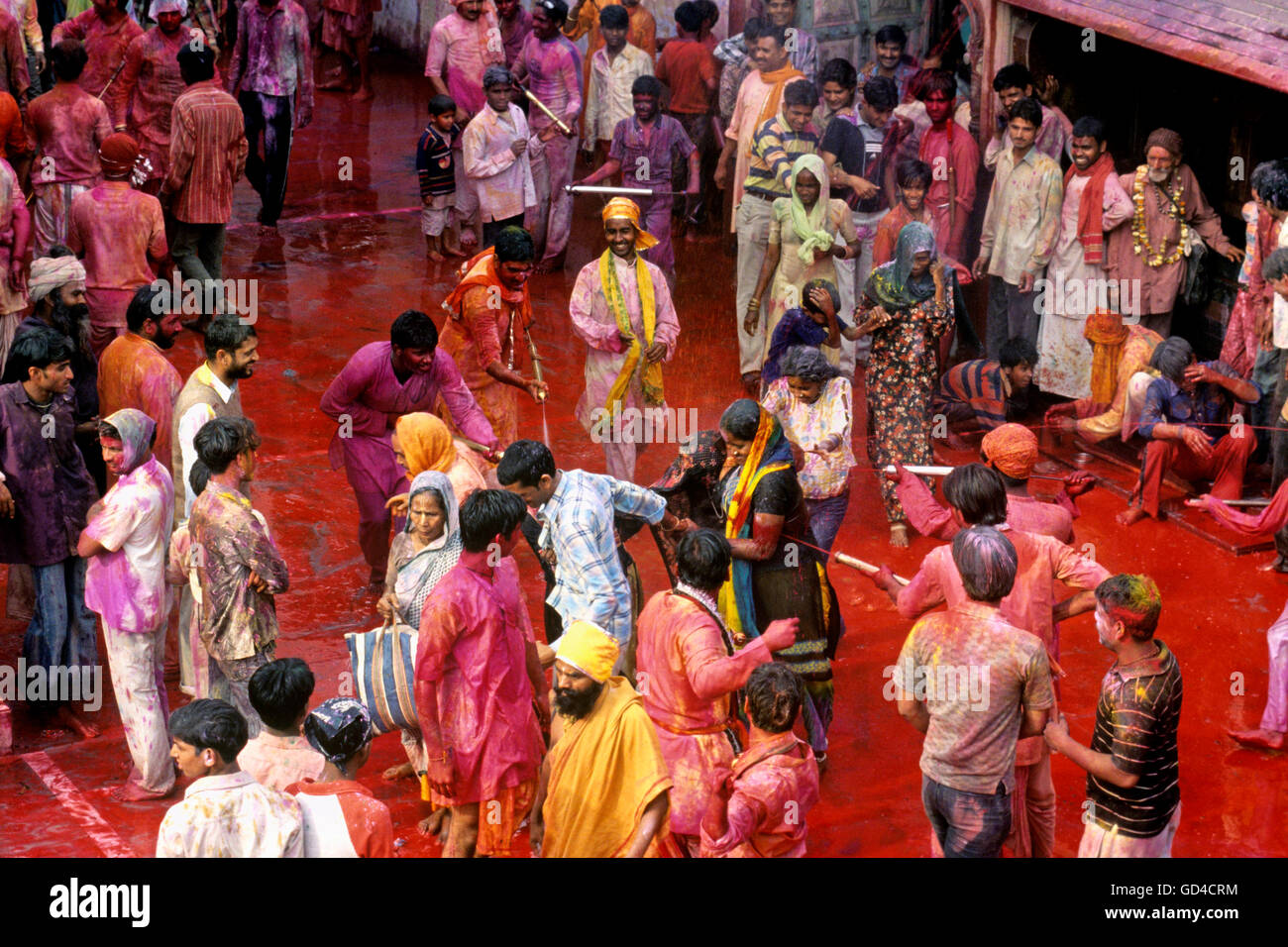 People playing holi Stock Photo - Alamy