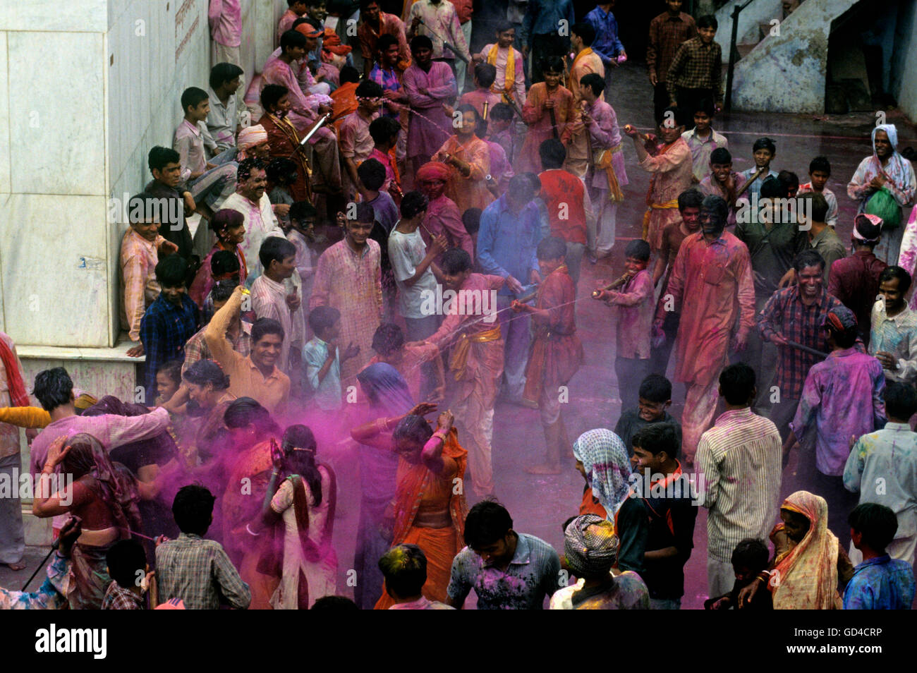 People playing holi Stock Photo - Alamy