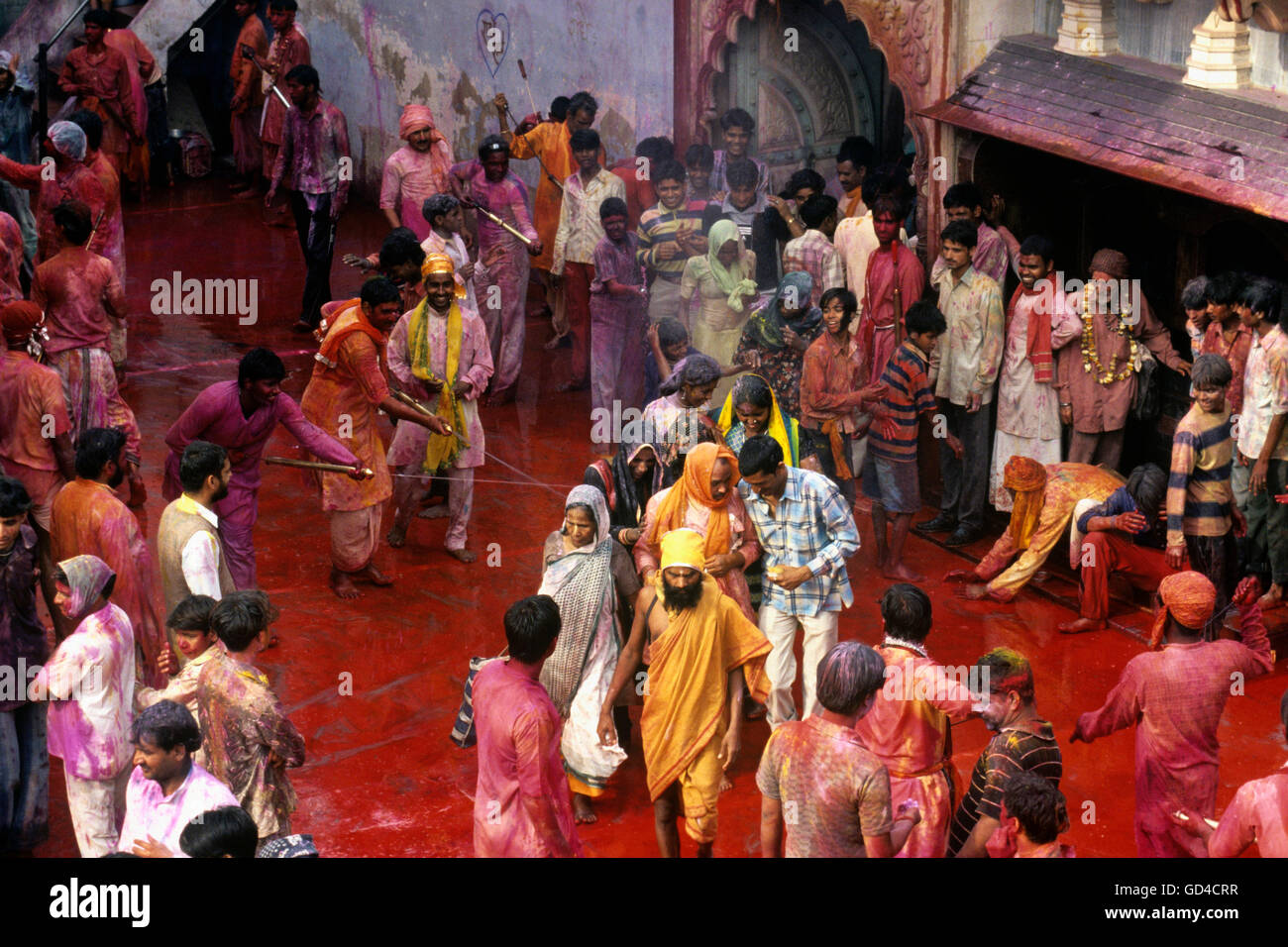 People playing holi Stock Photo - Alamy