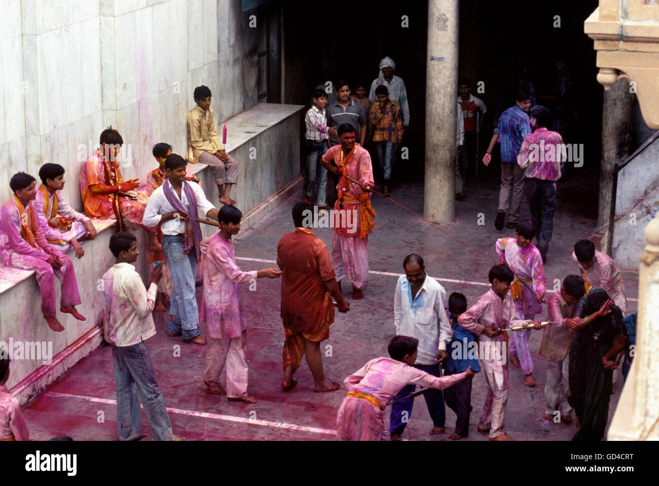 People playing holi Stock Photo - Alamy