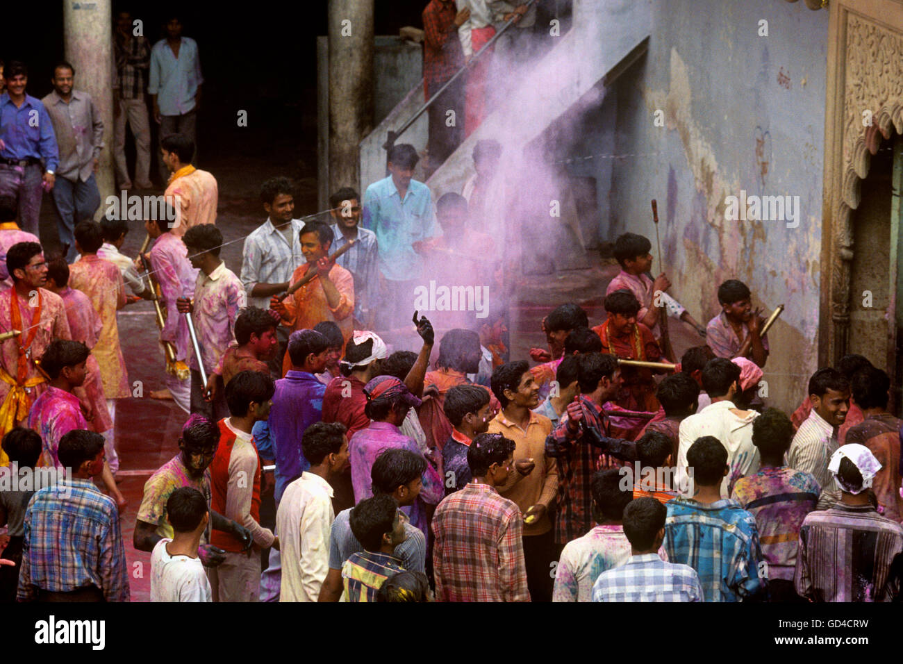 People playing holi Stock Photo - Alamy