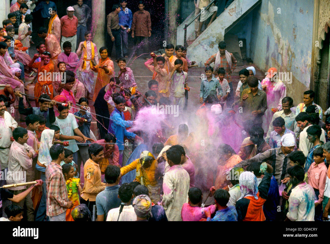 People playing holi Stock Photo - Alamy