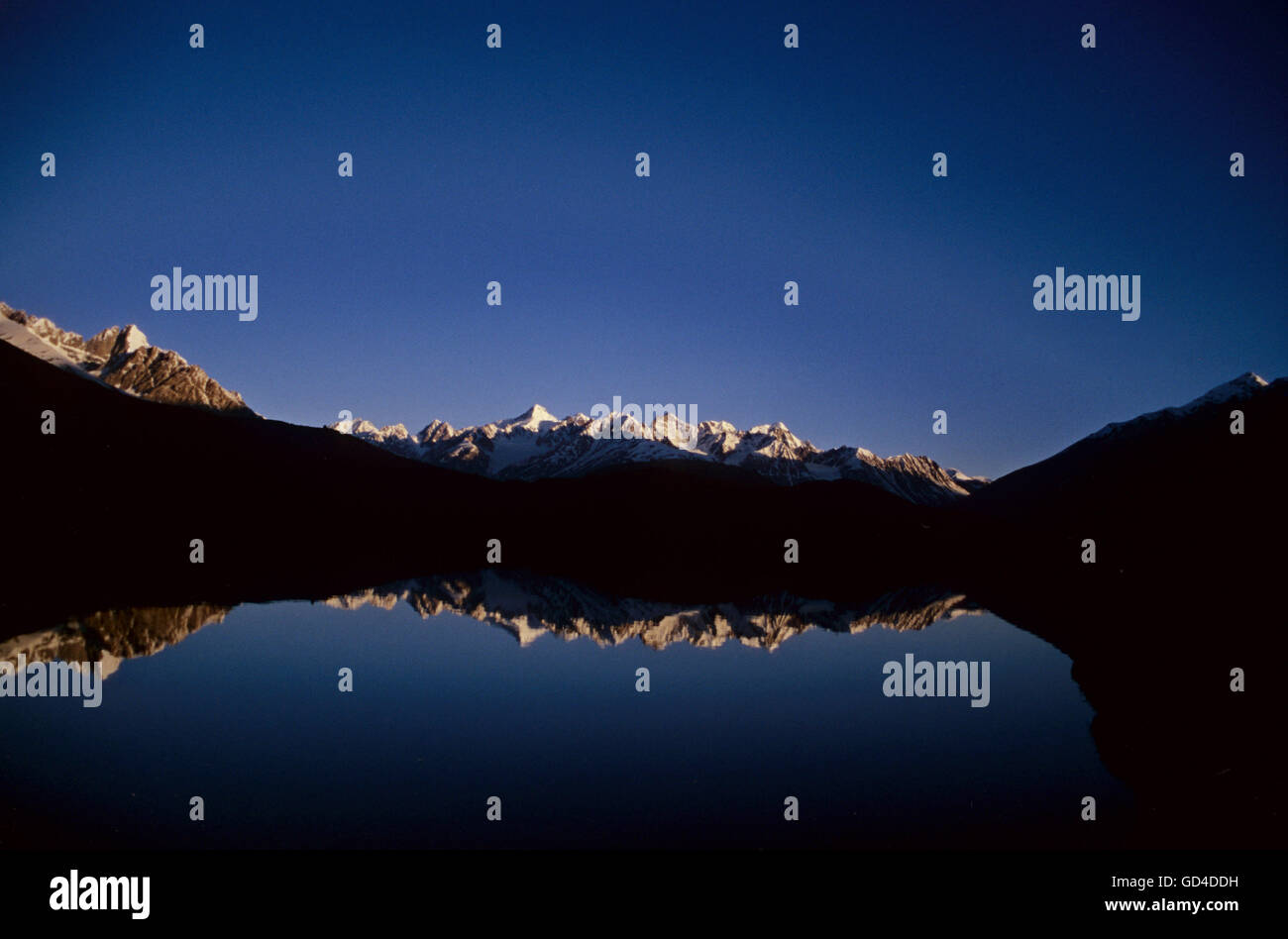 Reflection of mountains Stock Photo - Alamy