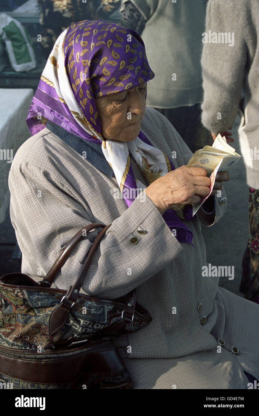 Women counting money Stock Photo - Alamy