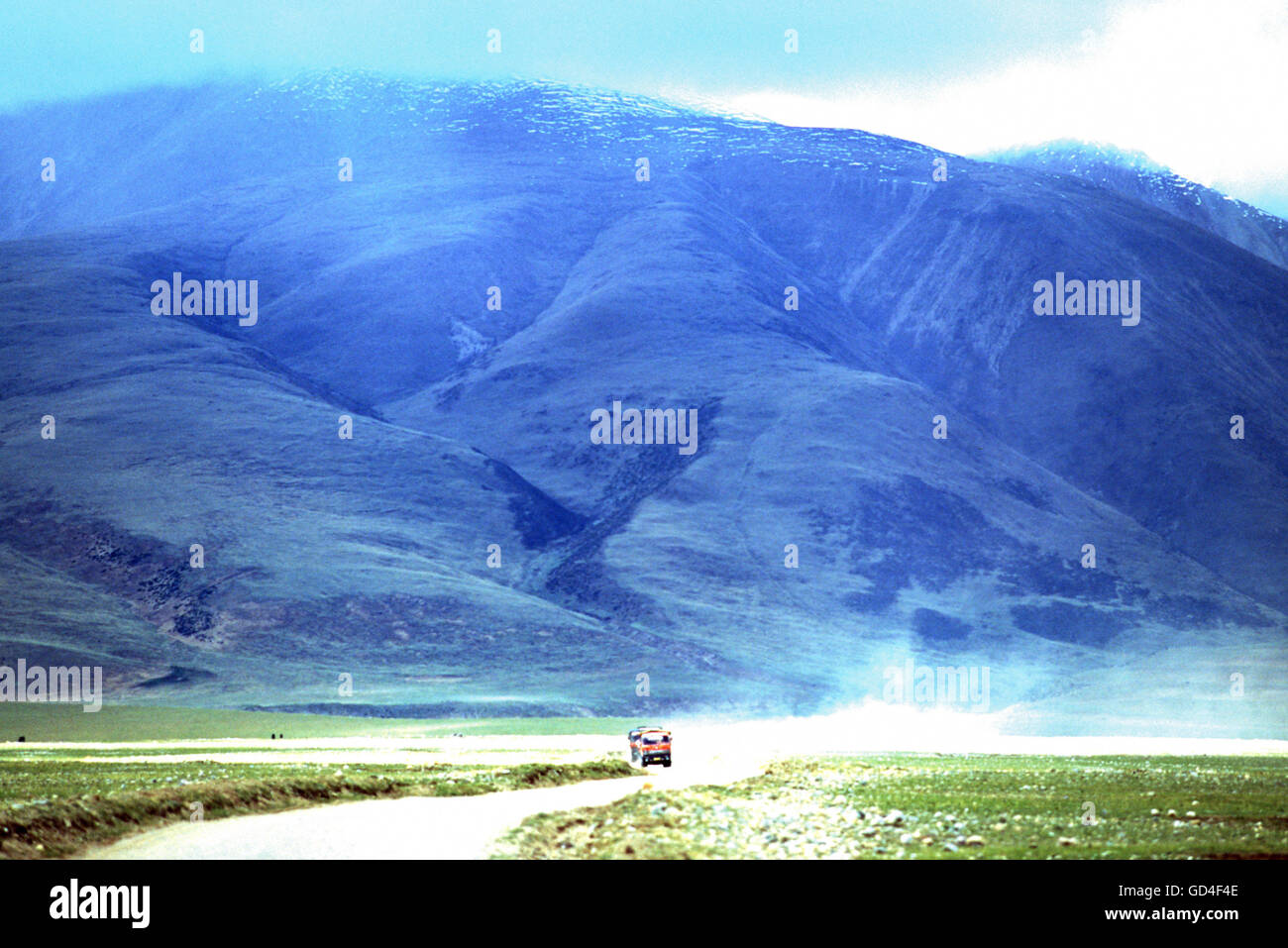 Trucks on a remote road Stock Photo - Alamy