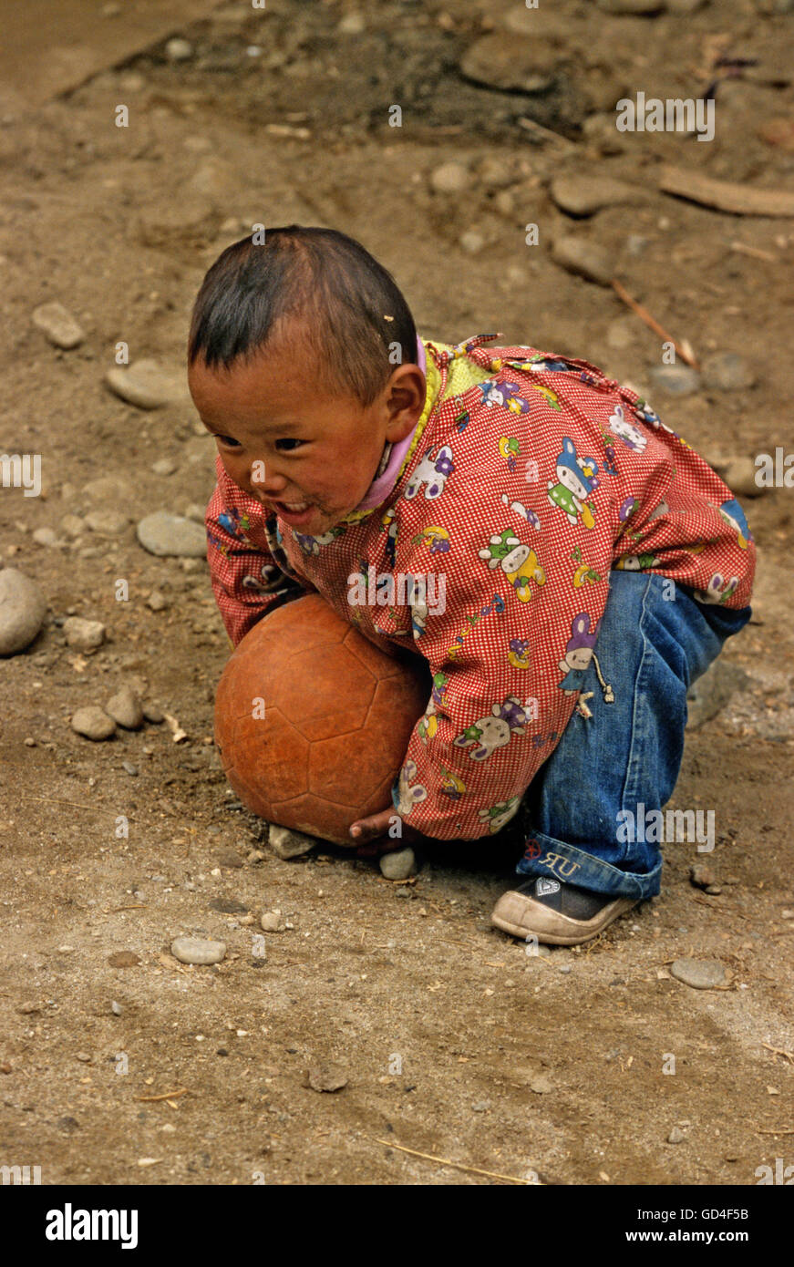 Child with a ball Stock Photo - Alamy