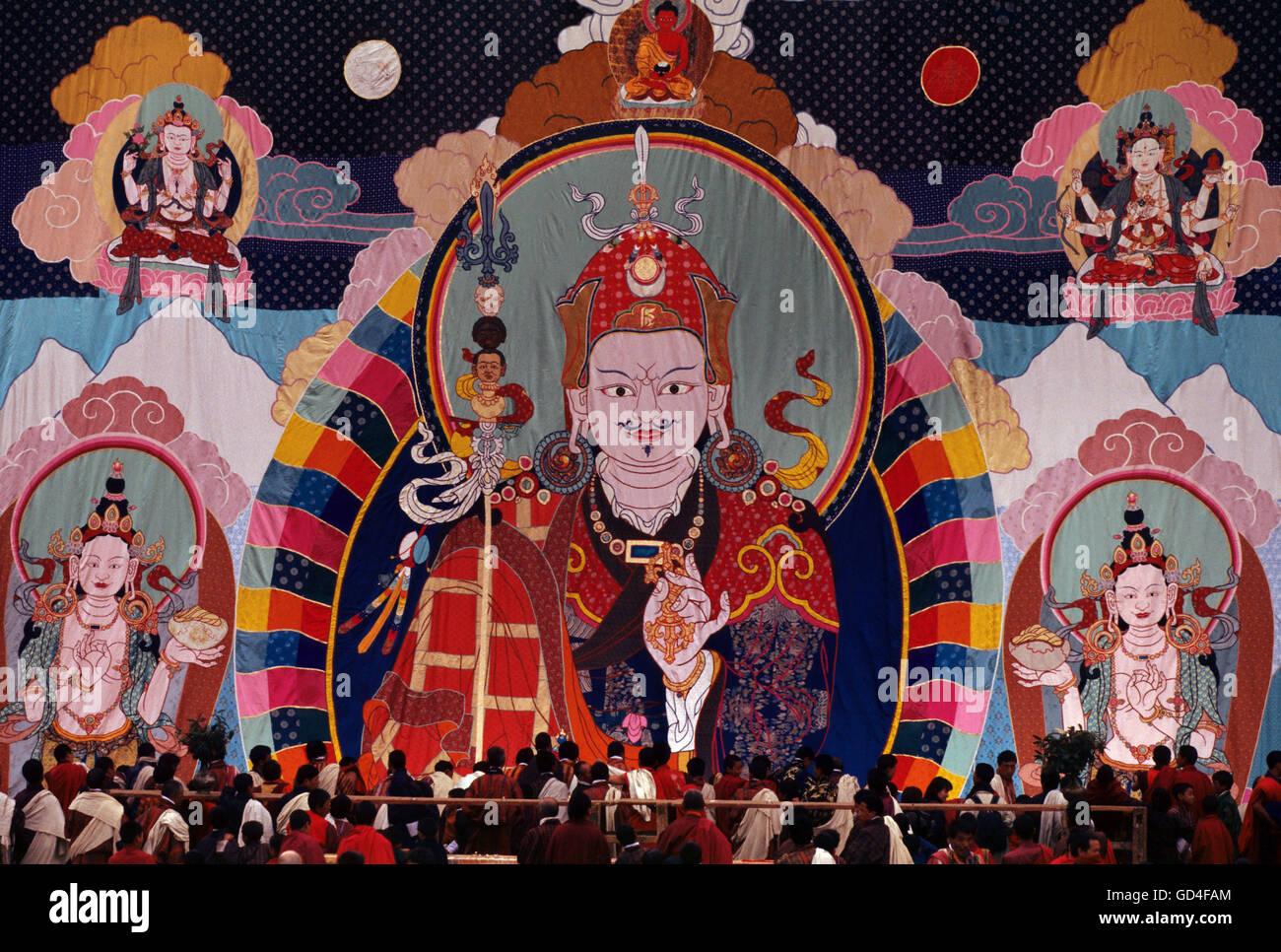 People facing a religious painting Stock Photo - Alamy