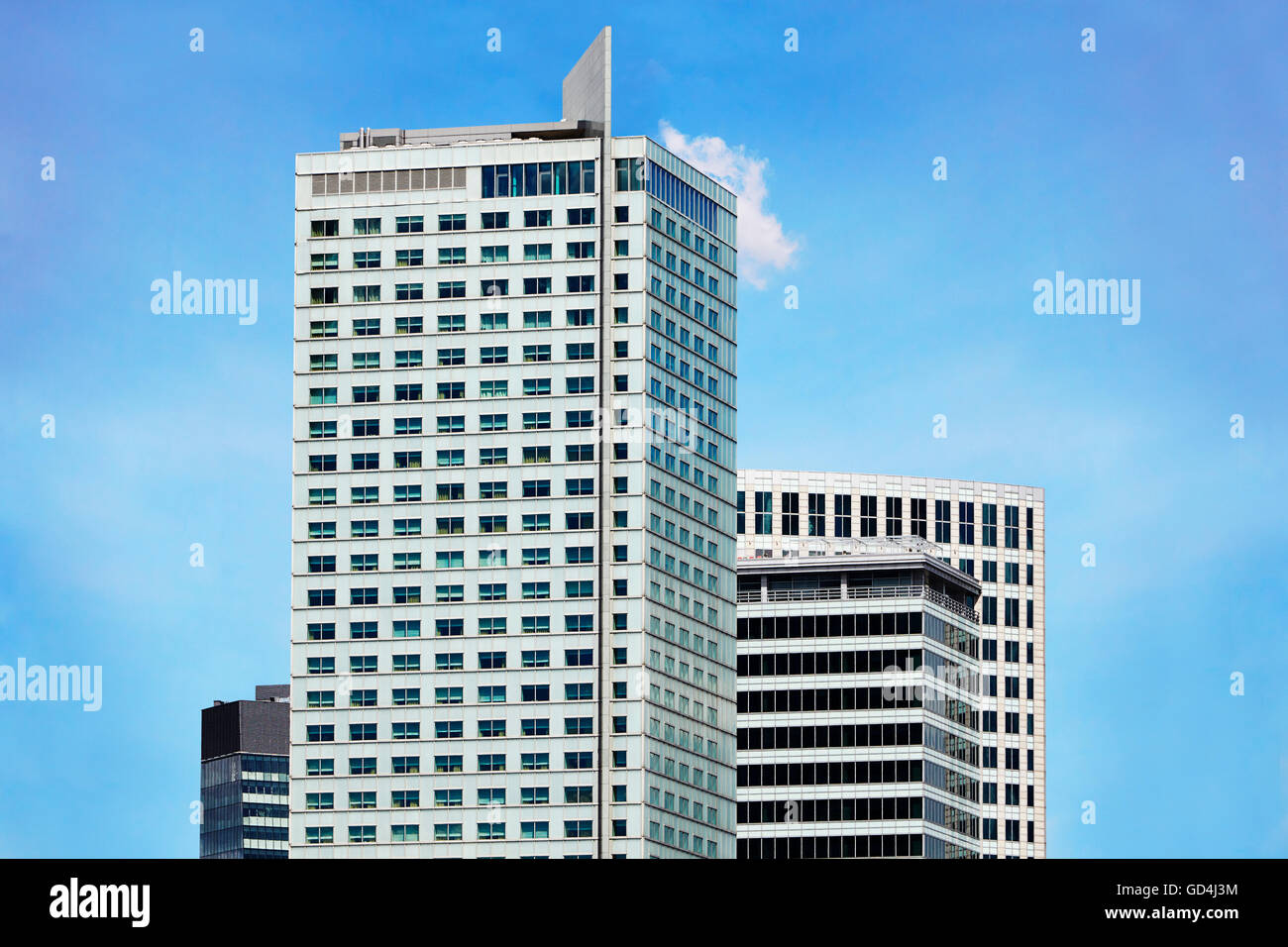 Top of high-rise business office building on blue sky Stock Photo - Alamy
