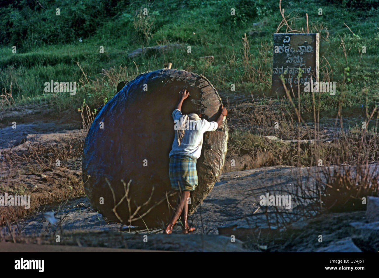 Man carrying coracle Stock Photo - Alamy