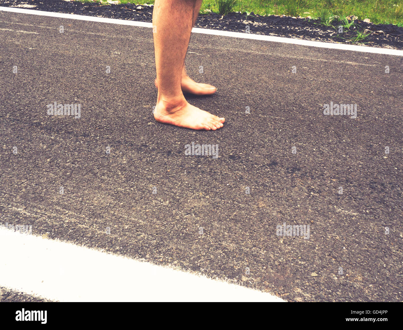 Barefoot on the road hi-res stock photography and images - Alamy