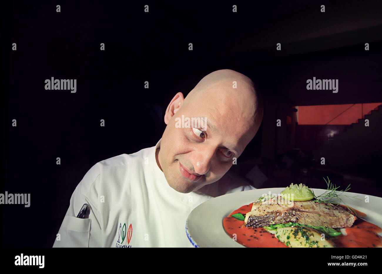 Man tempted by food Stock Photo - Alamy