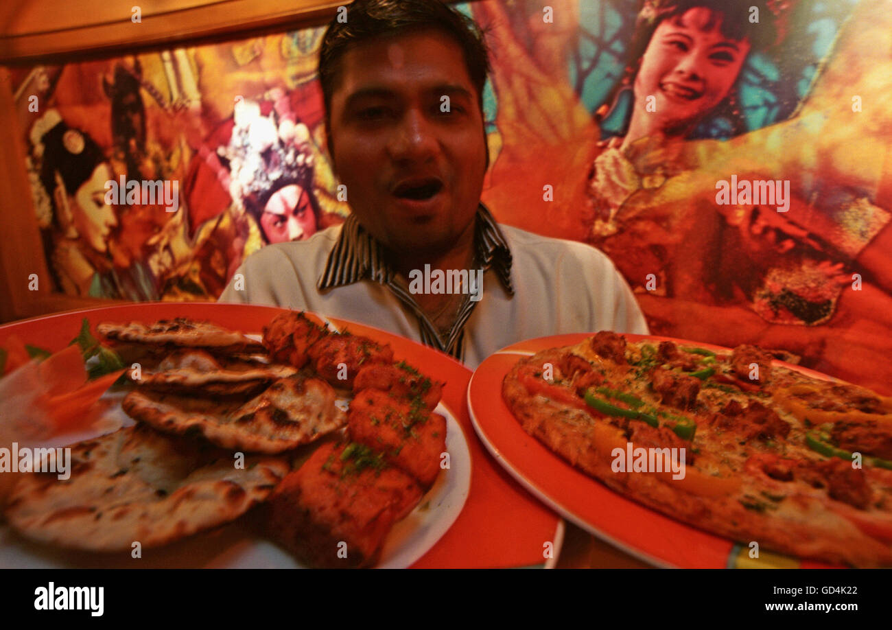 Man with food Stock Photo - Alamy