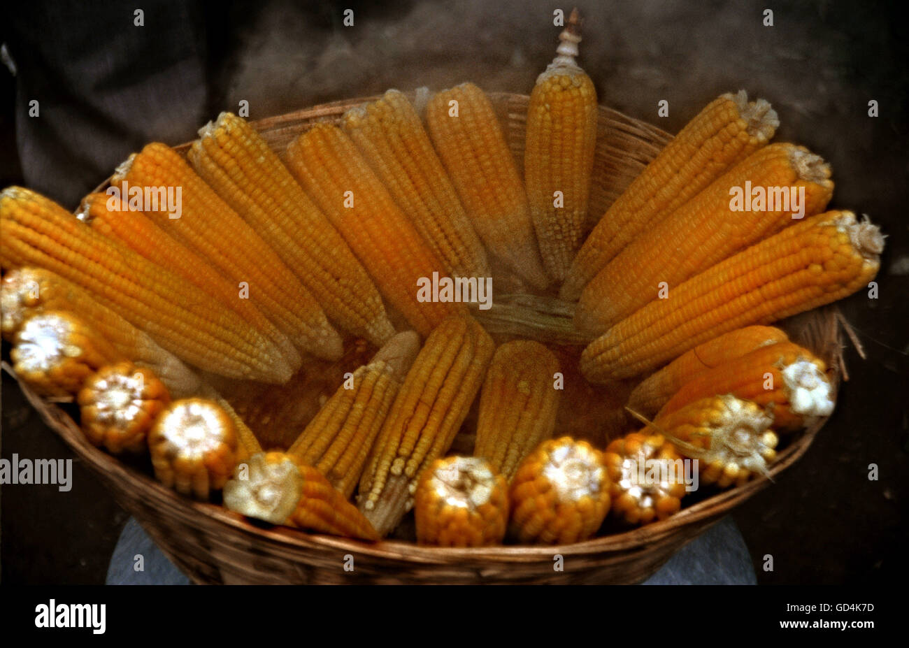 Corn in a basket Stock Photo - Alamy