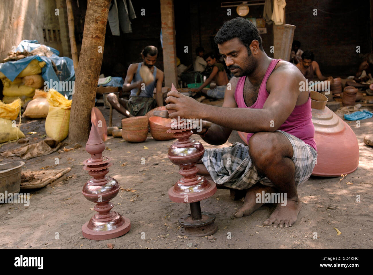 Man making pottery Stock Photo - Alamy