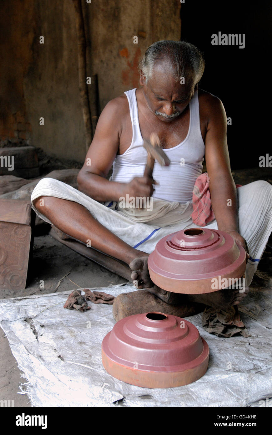 Man making pottery Stock Photo - Alamy