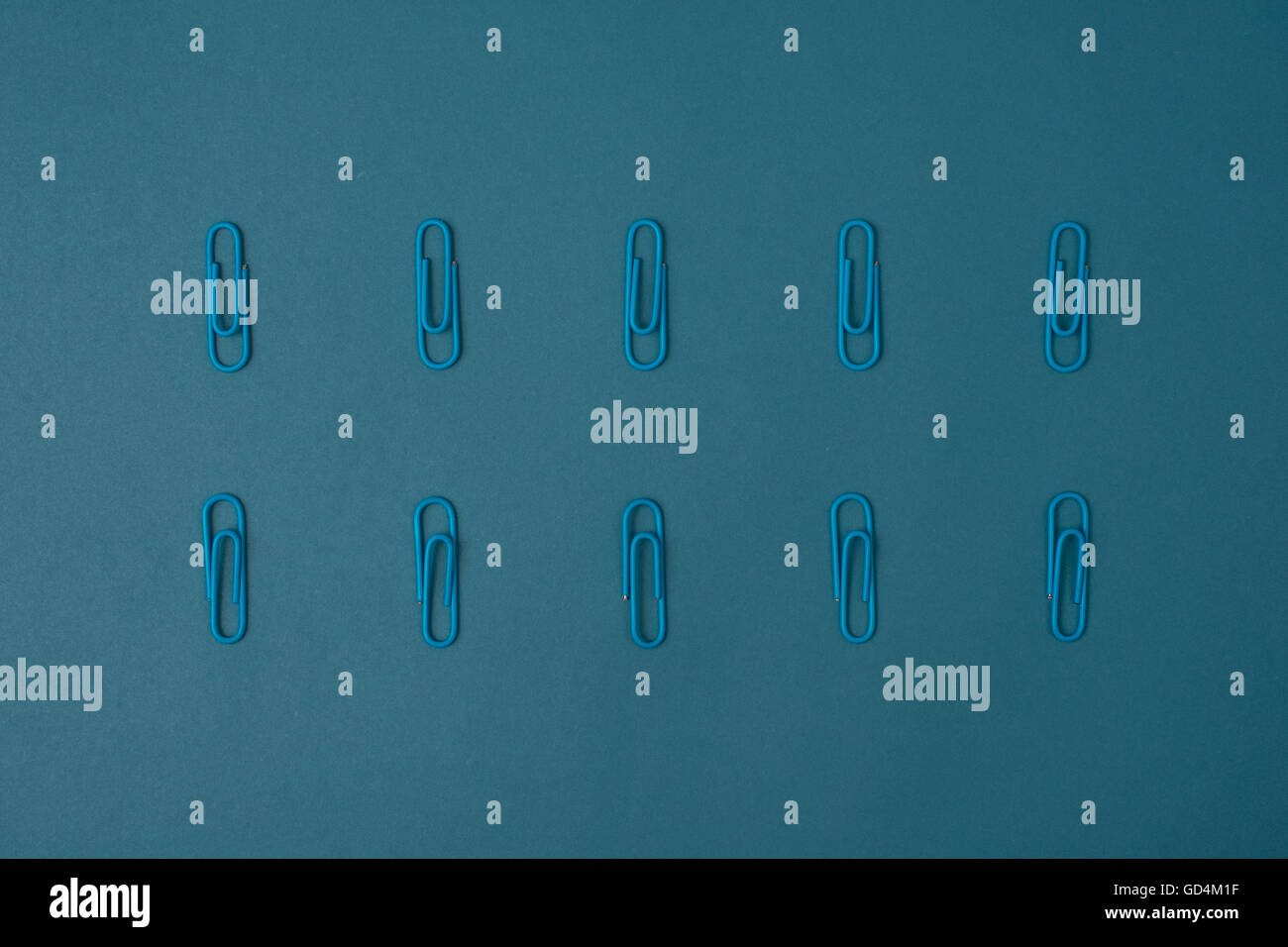 Close-up of blue paper clips Stock Photo - Alamy