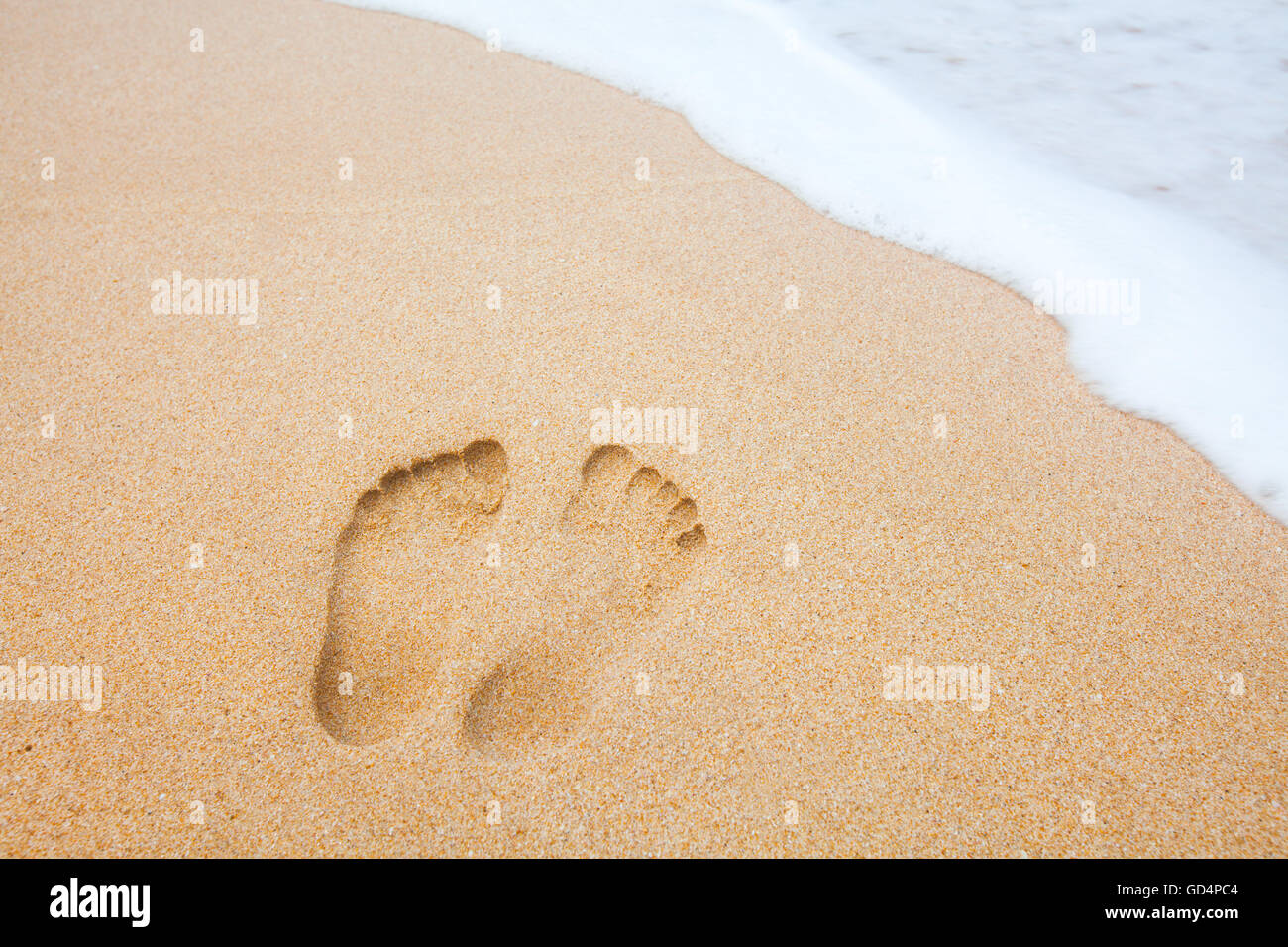 beach, wave and footprints Stock Photo - Alamy