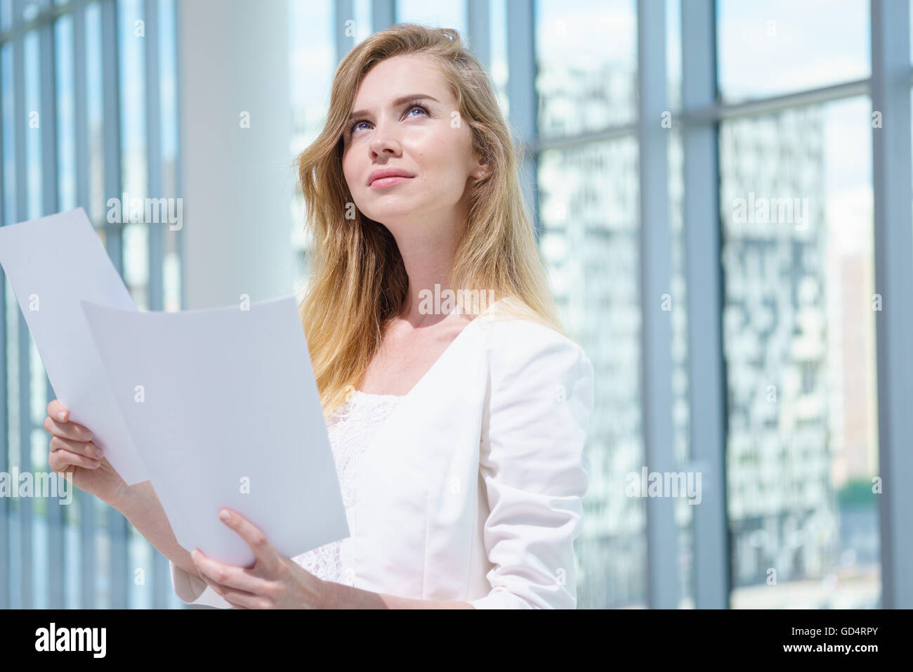 Woman with documents Stock Photo - Alamy