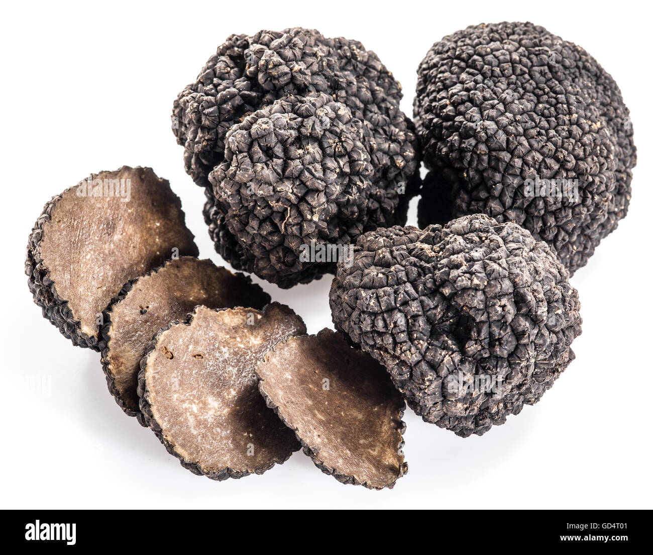 Black truffles isolated on a white background Stock Photo - Alamy