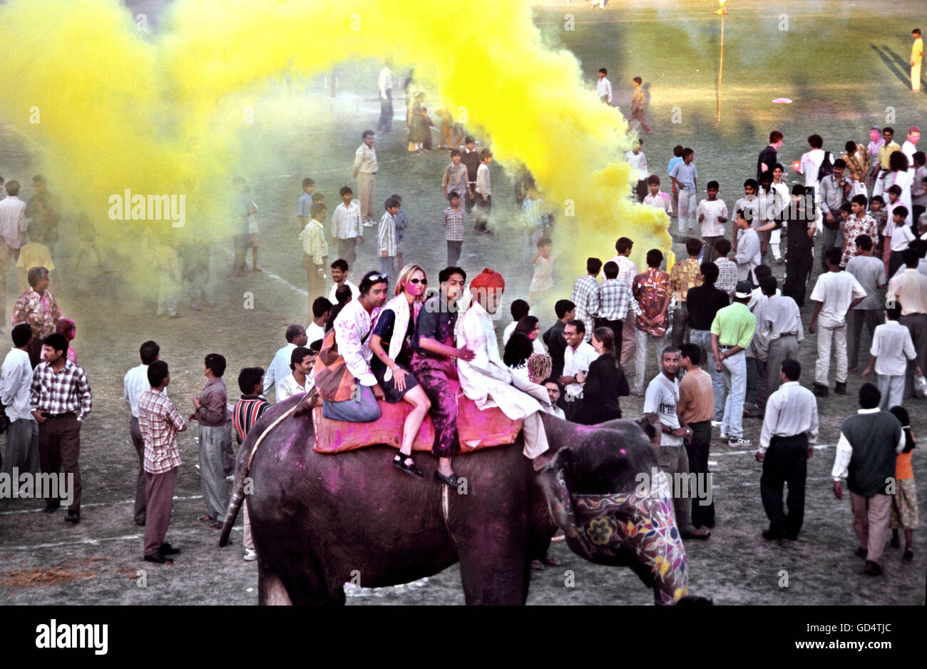 People playing holi Stock Photo - Alamy