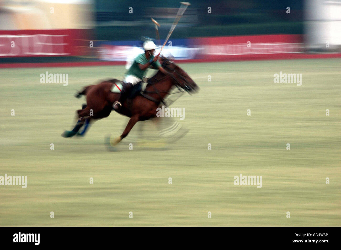 Polo Player in Action Stock Photo - Alamy