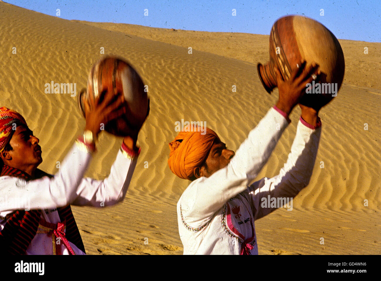 Men with clay pots Stock Photo - Alamy