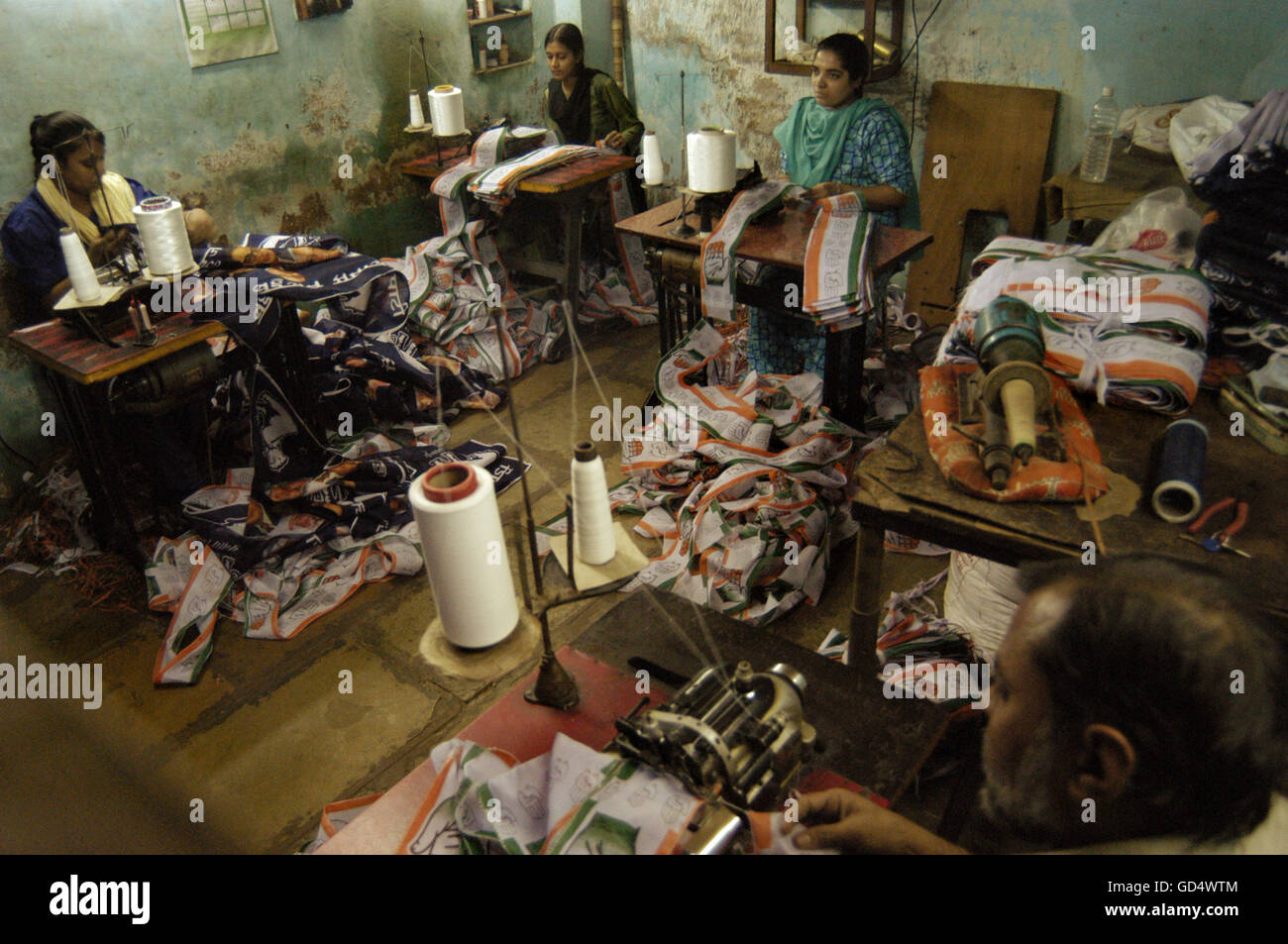 Women stitching flags Stock Photo - Alamy