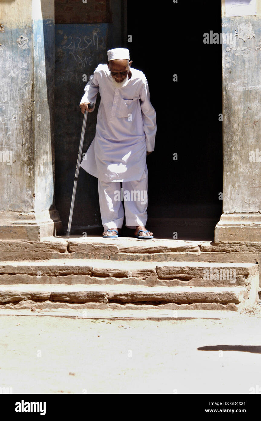 Old man outside polling booth Stock Photo - Alamy