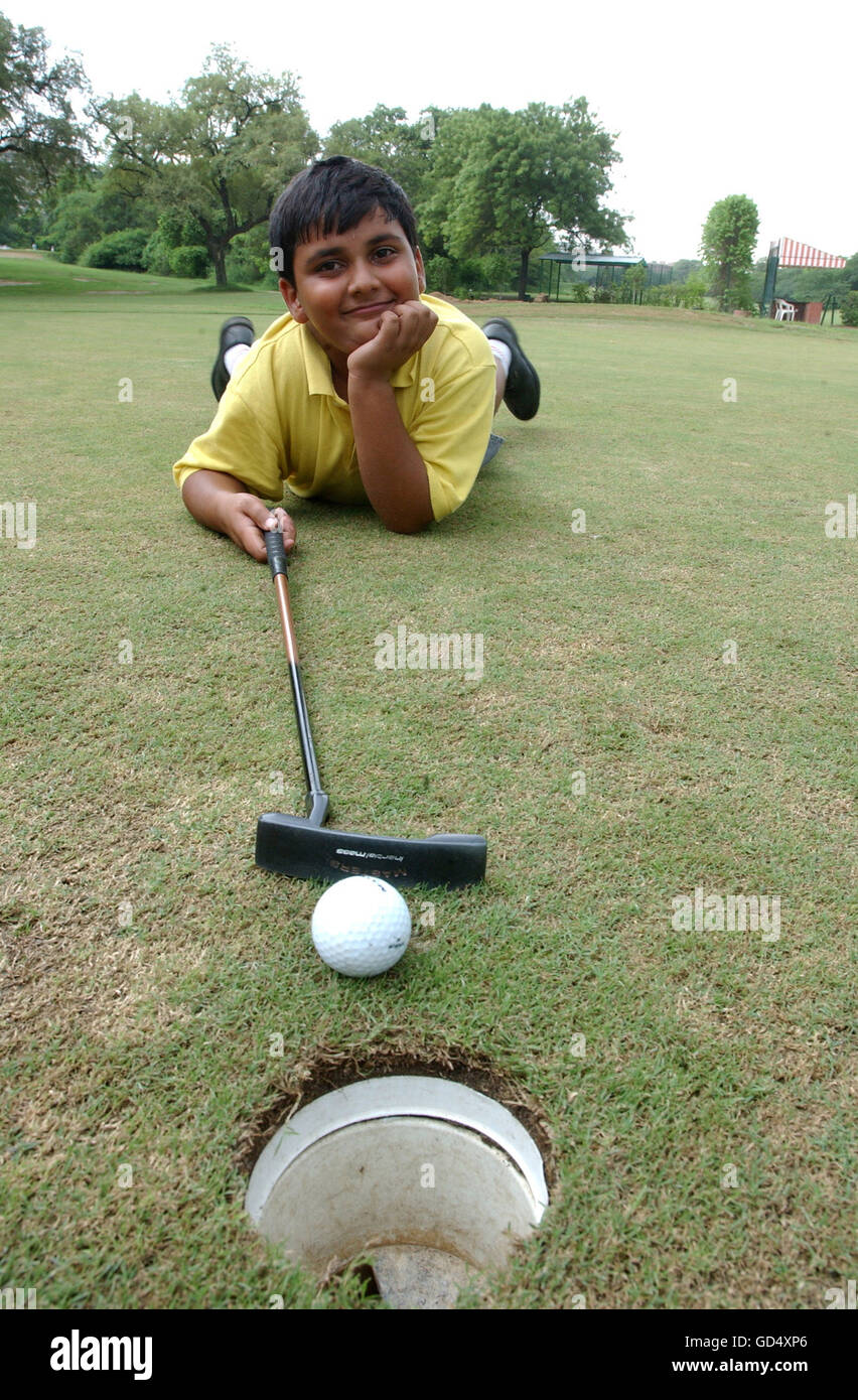 Golf boy hi-res stock photography and images - Alamy