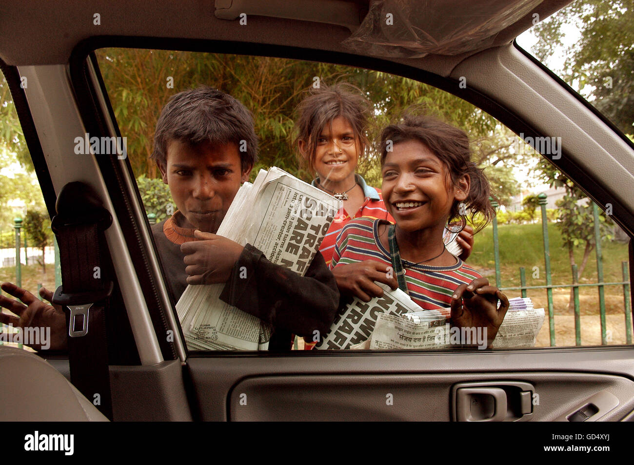 Young boy selling newspapers hi-res stock photography and images - Alamy