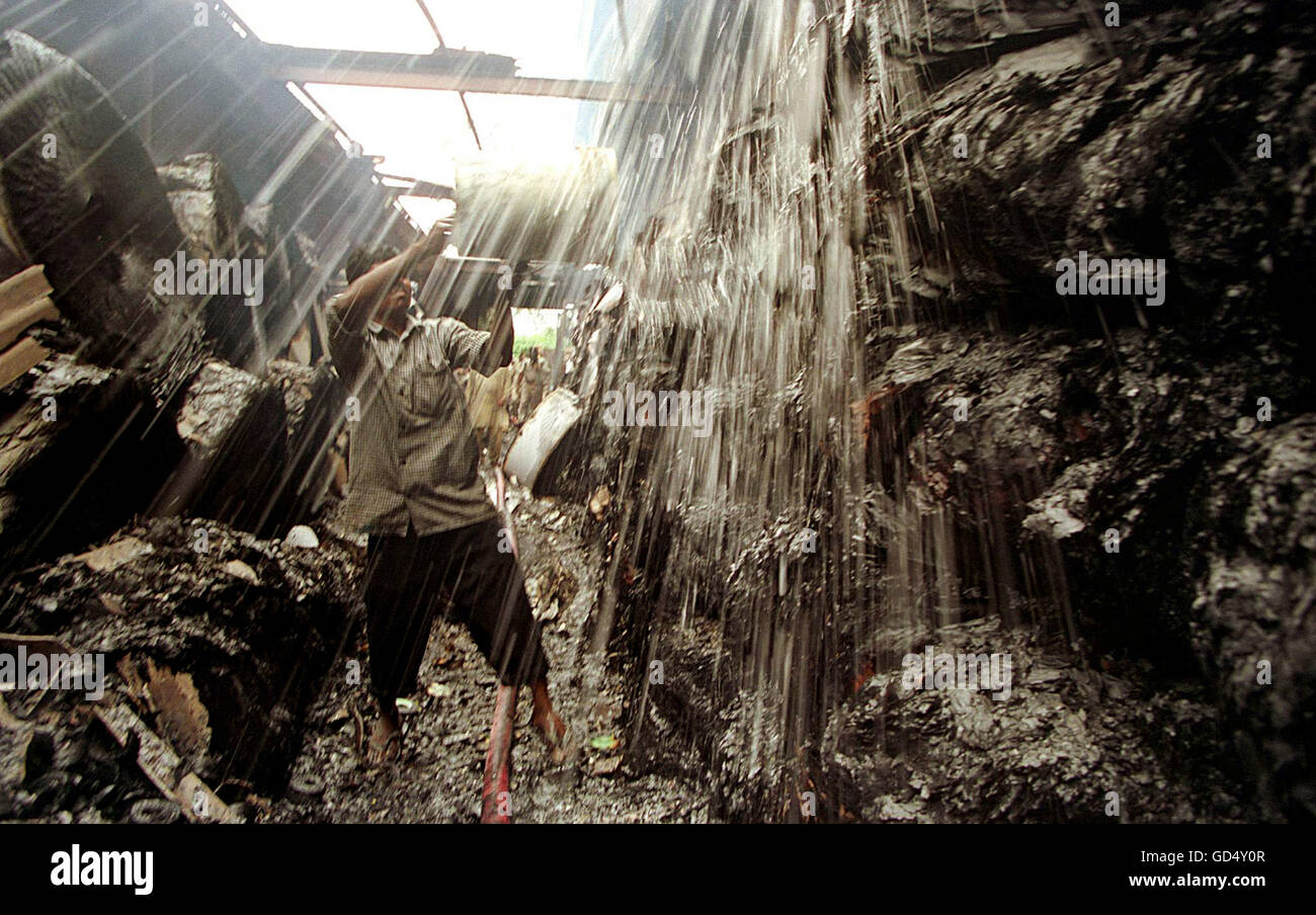 Worker get drenched in water Stock Photo - Alamy