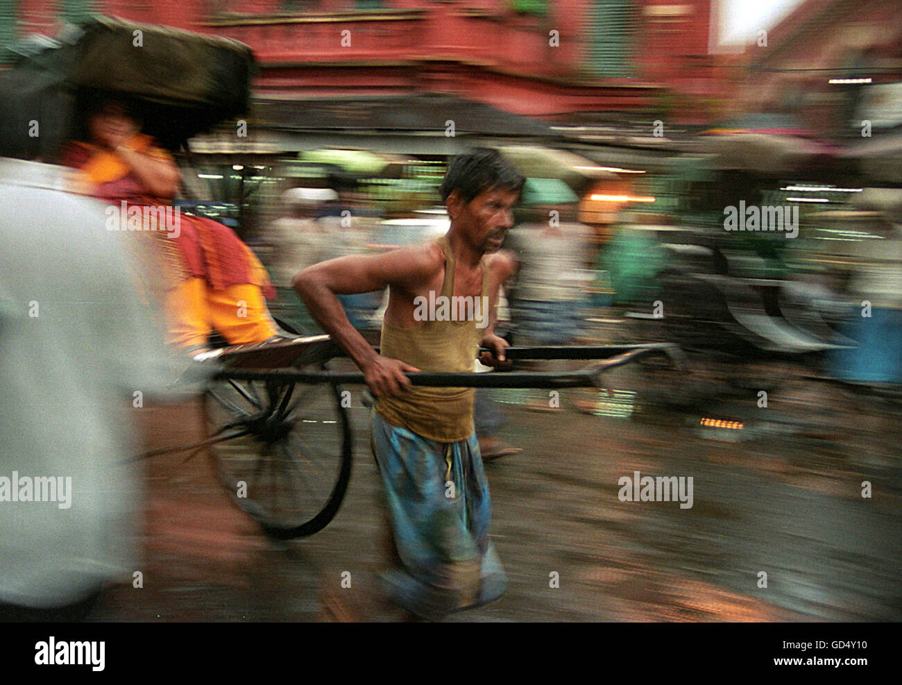Hand pulled rickshaw Stock Photo - Alamy