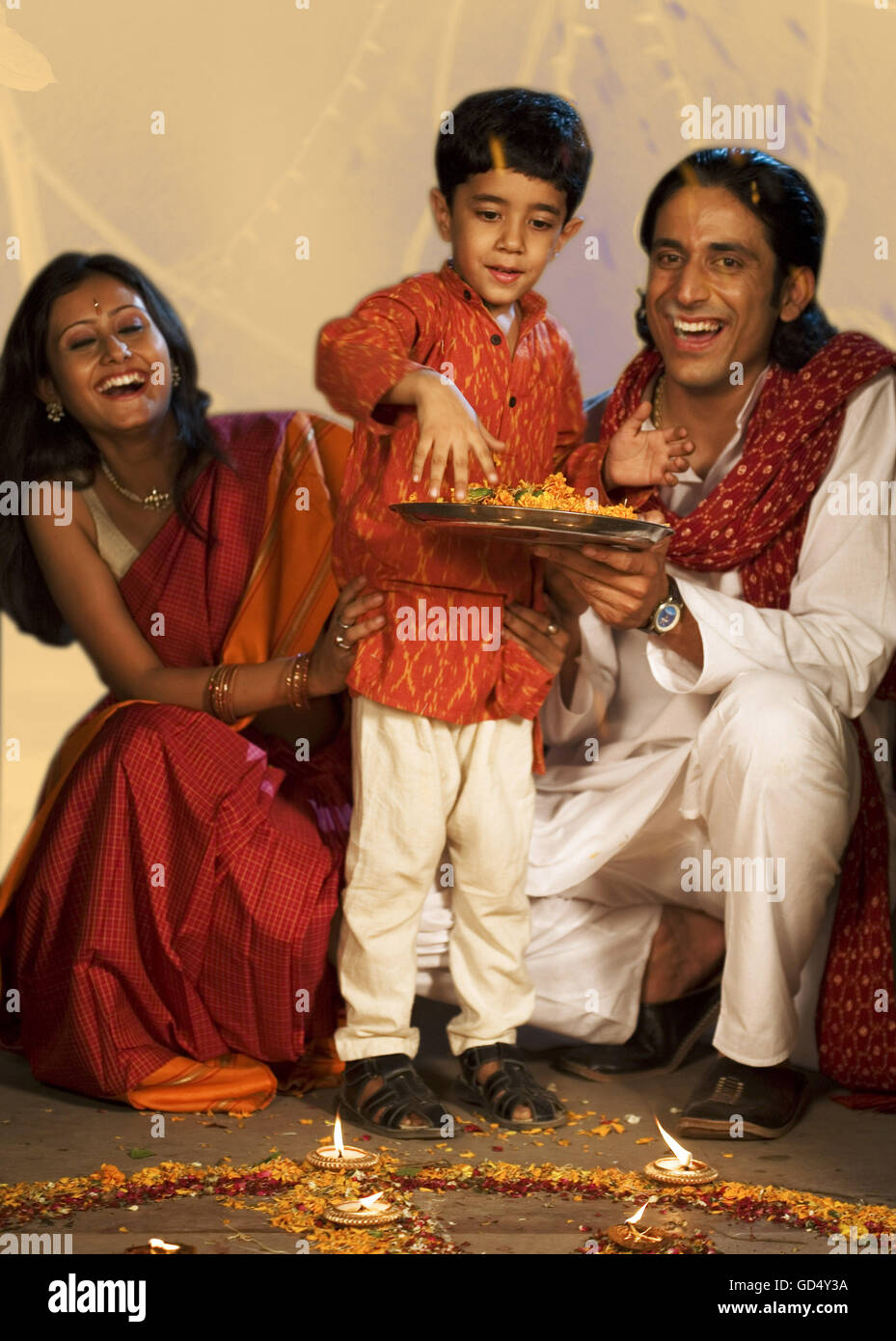Family celebrating Diwali Stock Photo - Alamy