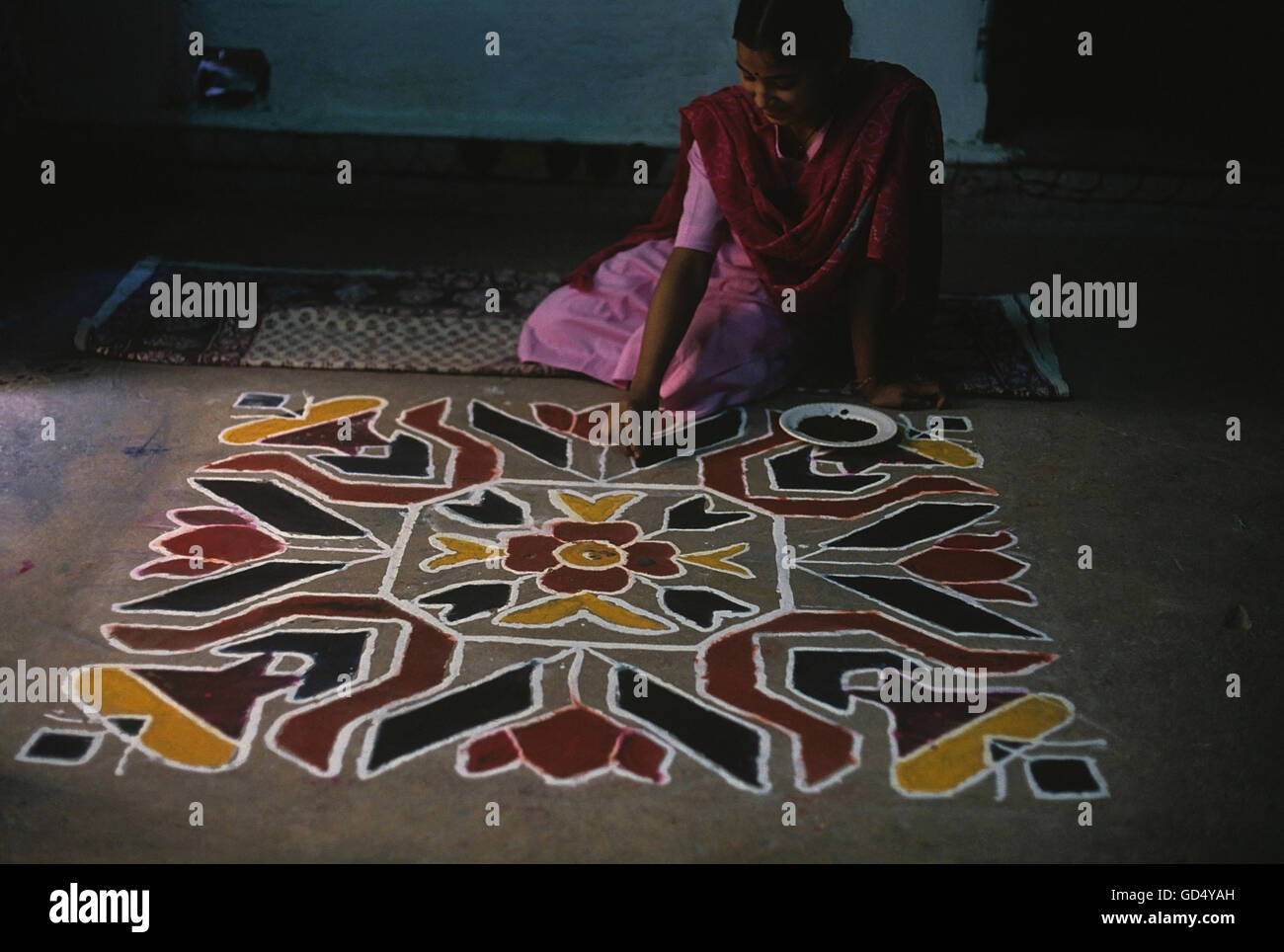 India woman rangoli pattern hi-res stock photography and images - Alamy